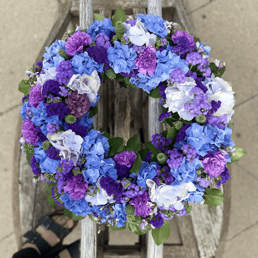 Krans i lilla nuancer » Blomsterbinderiet Kongsbro